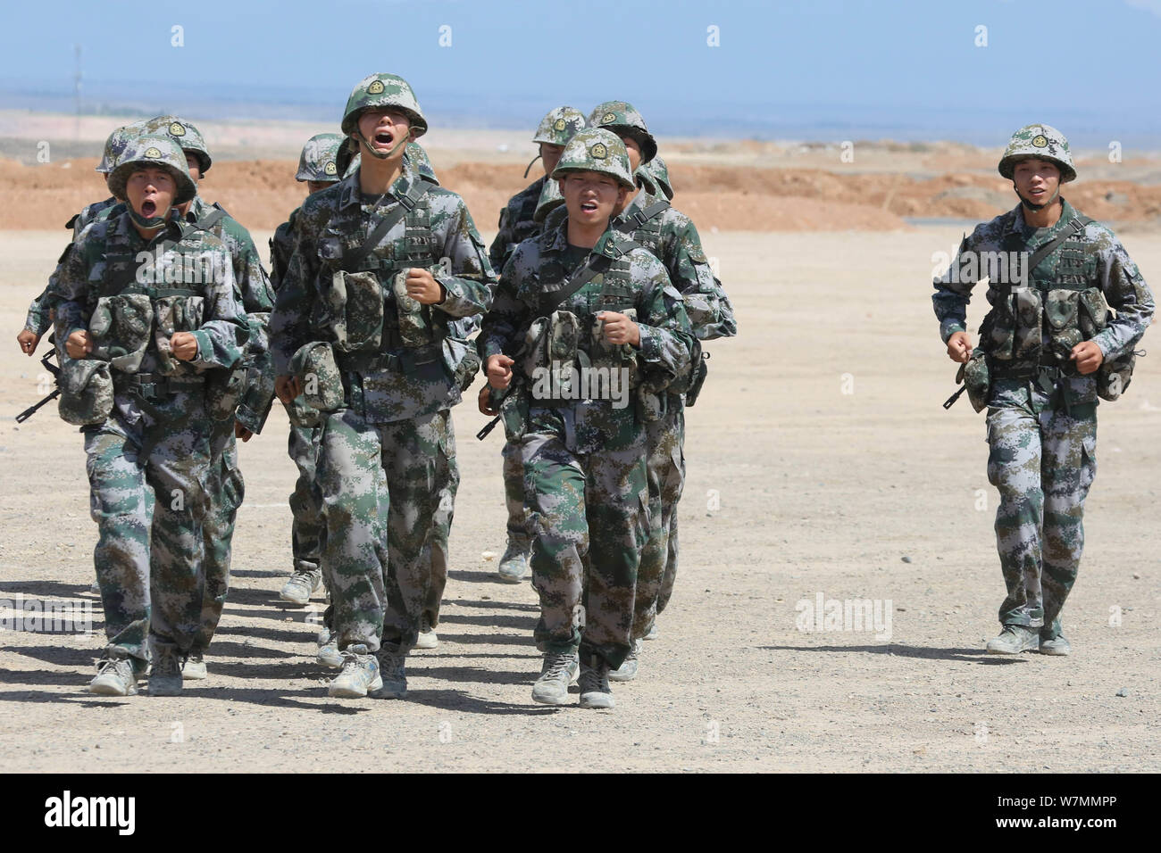 Chinese soldiers of the PLA (People's Liberation Army) take part in a ...
