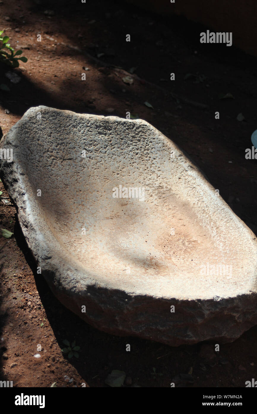 Smooth flat stone used to grind maize on display at Lesedi Cultural ...