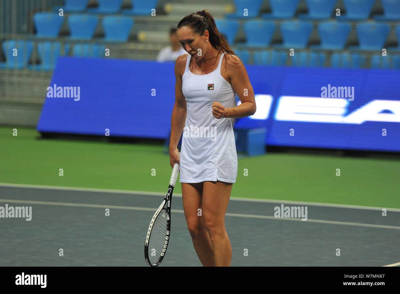 Jelena Jankovic of Serbia reacts after scoring against Kang Jiaqi of China in their women's ...