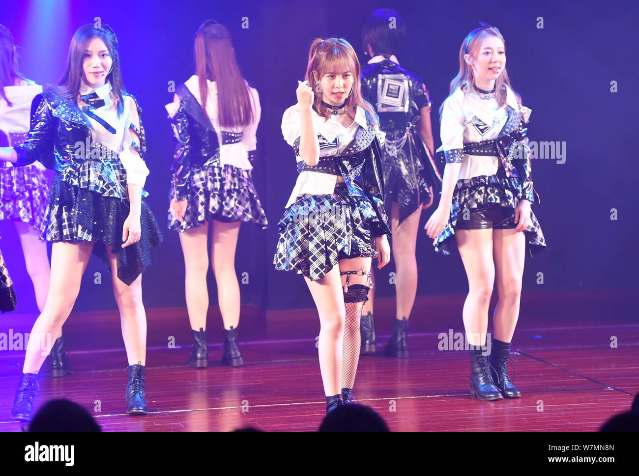 Members of Chinese idol girl group SNH48 TEAM HII perform during the public debut of their 4th ...