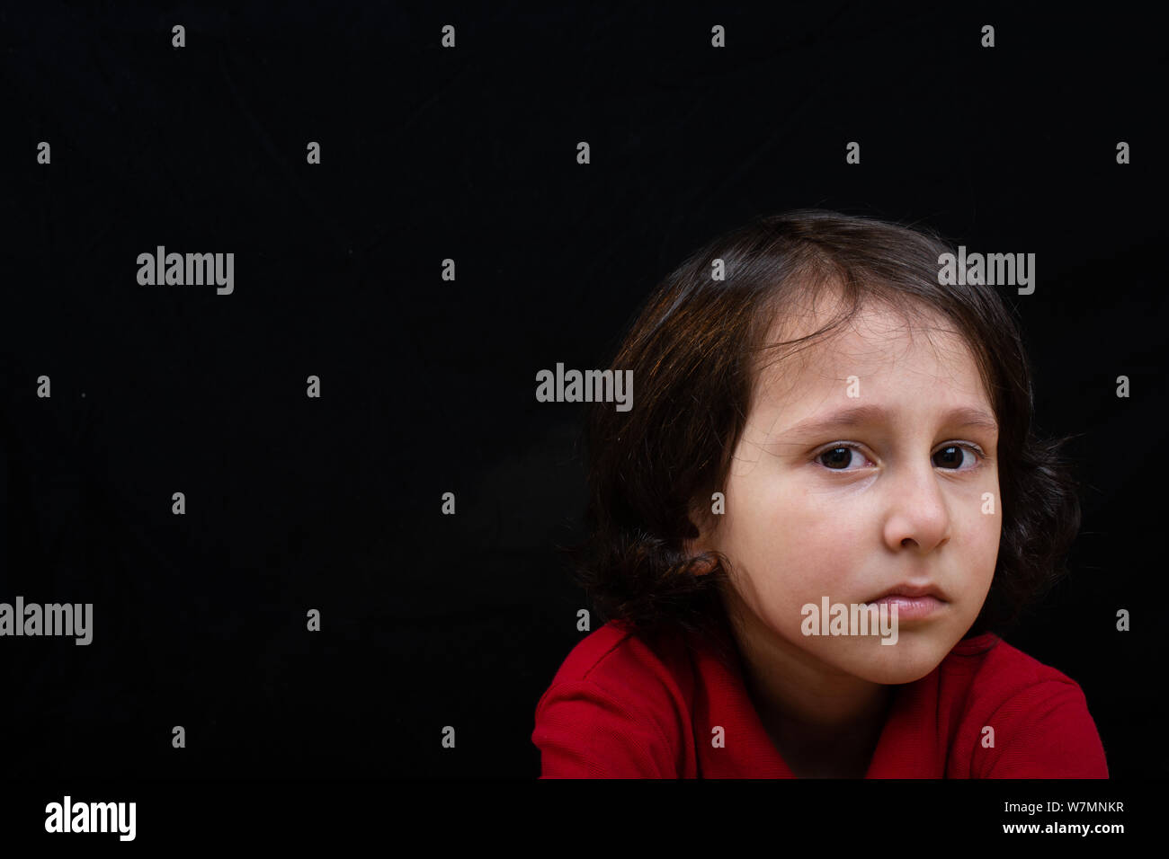 View of a crying boy studio shot Stock Photo - Alamy