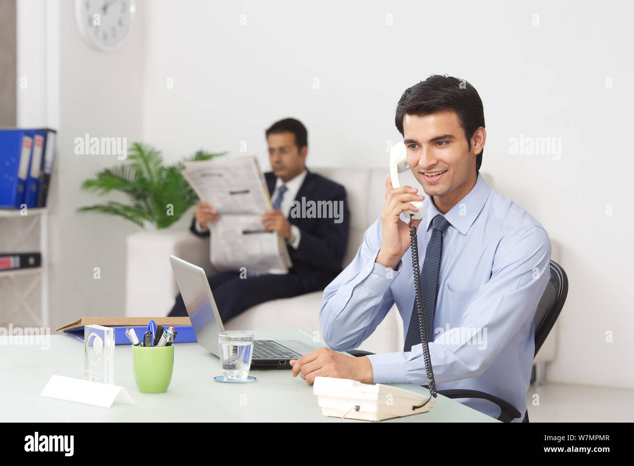 Man on telephone waiting landline hi-res stock photography and images ...