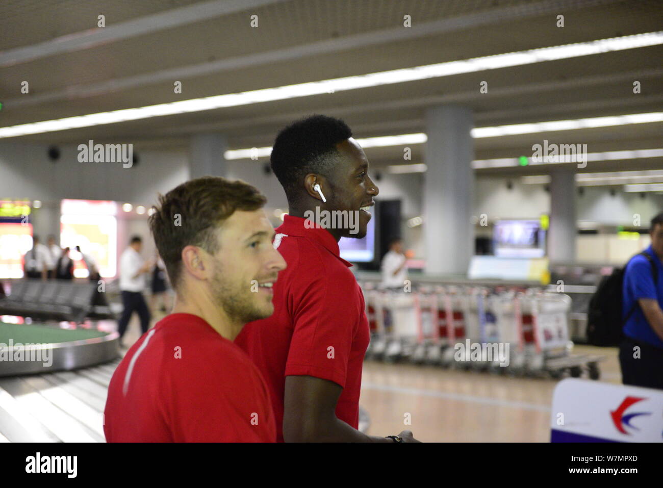 Players and coaching staff of Arsenal F.C. are pictured after arriving ...