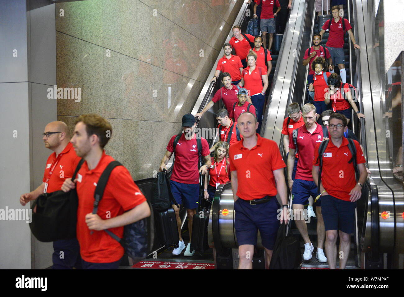 Players and coaching staff of Arsenal F.C. are pictured after arriving ...