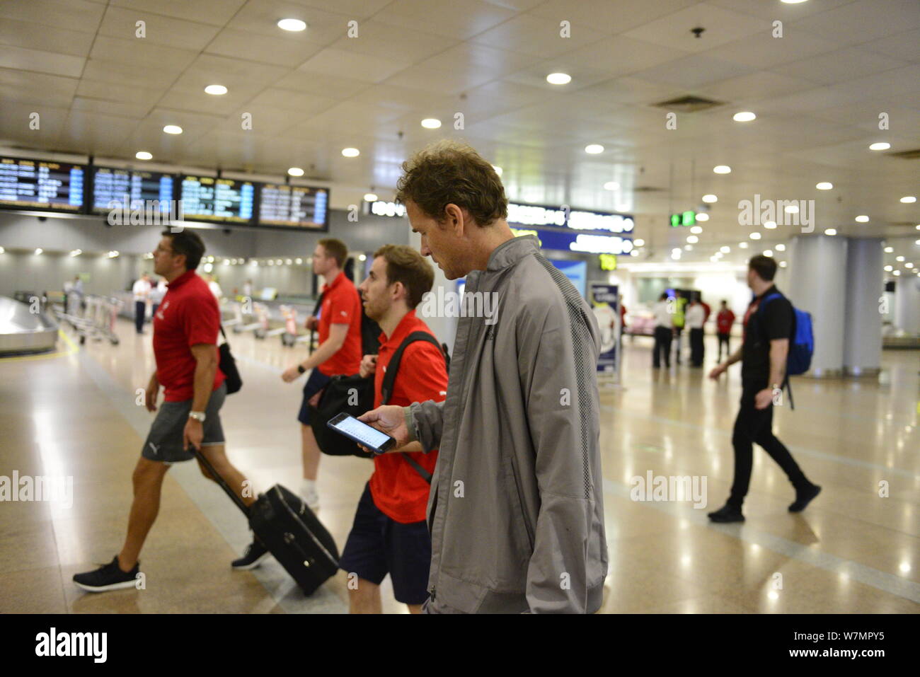 Players and coaching staff of Arsenal F.C. are pictured after arriving ...