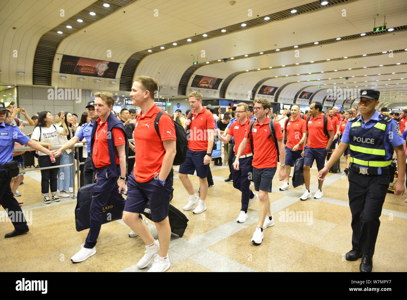 Players and coaching staff of Arsenal F.C. are pictured after arriving ...