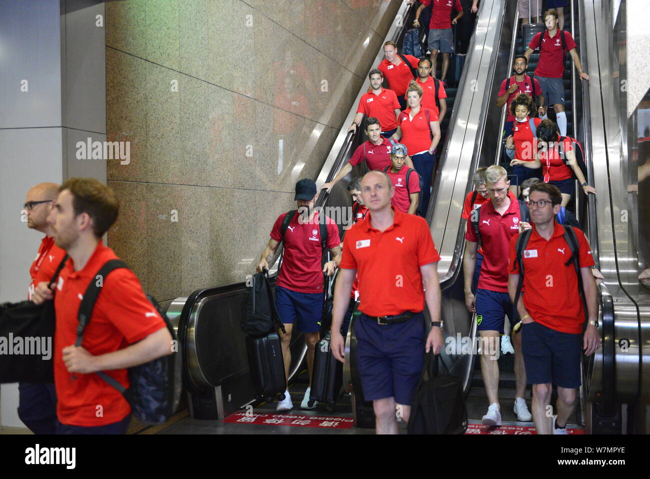 Players and coaching staff of Arsenal F.C. are pictured after arriving ...