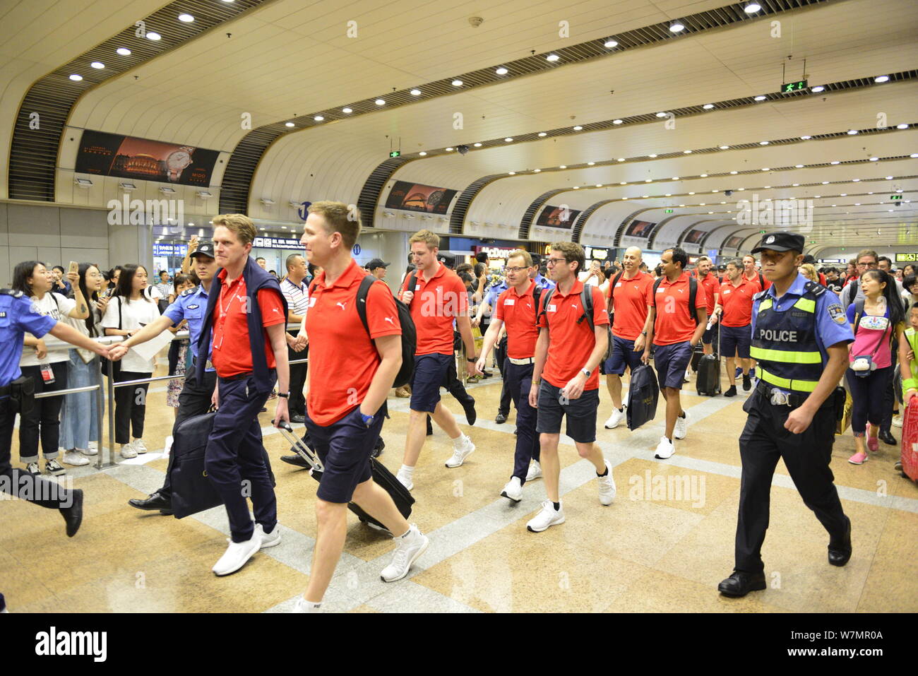 Players and coaching staff of Arsenal F.C. are pictured after arriving ...