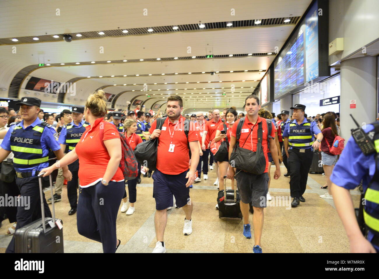Players and coaching staff of Arsenal F.C. are pictured after arriving ...
