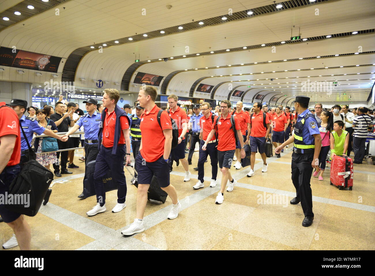 Players and coaching staff of Arsenal F.C. are pictured after arriving ...