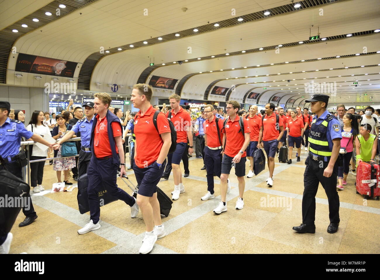 Players and coaching staff of Arsenal F.C. are pictured after arriving ...