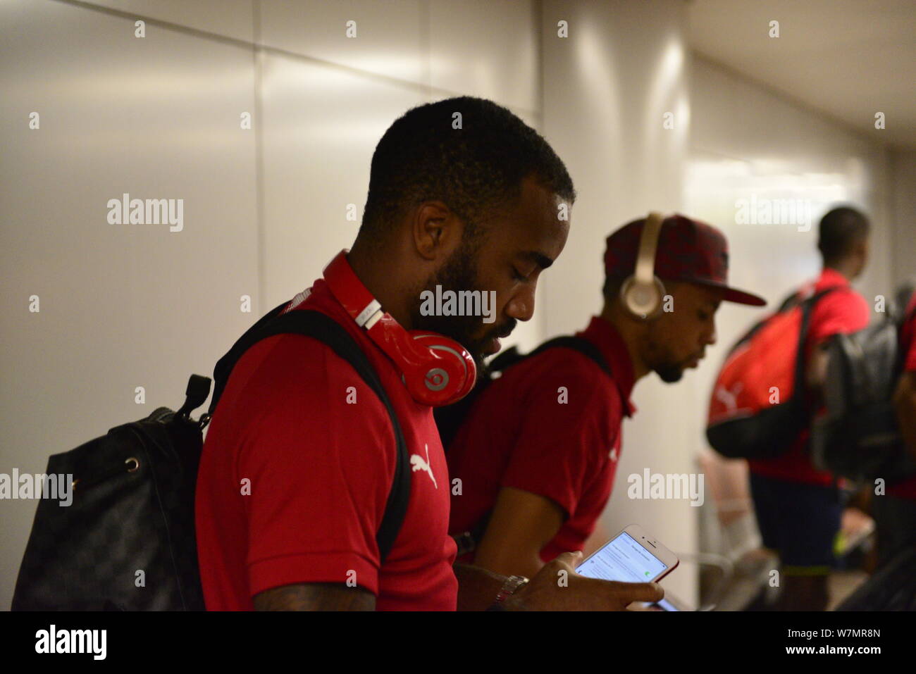 Players and coaching staff of Arsenal F.C. are pictured after arriving ...