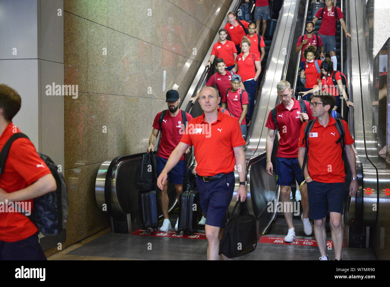 Players and coaching staff of Arsenal F.C. are pictured after arriving ...