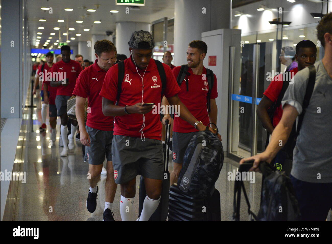 Players and coaching staff of Arsenal F.C. are pictured after arriving ...