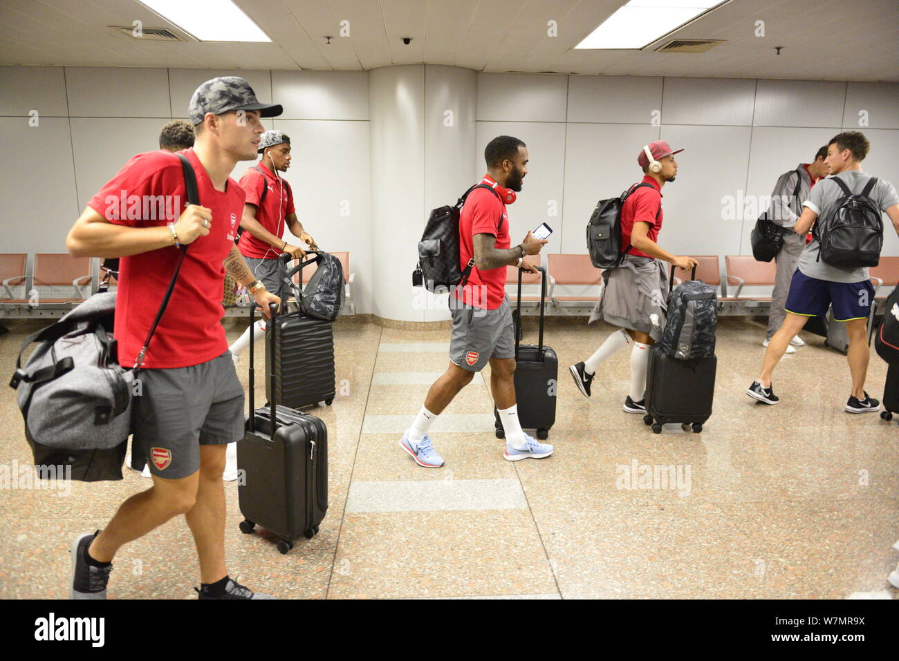 Players and coaching staff of Arsenal F.C. are pictured after arriving ...