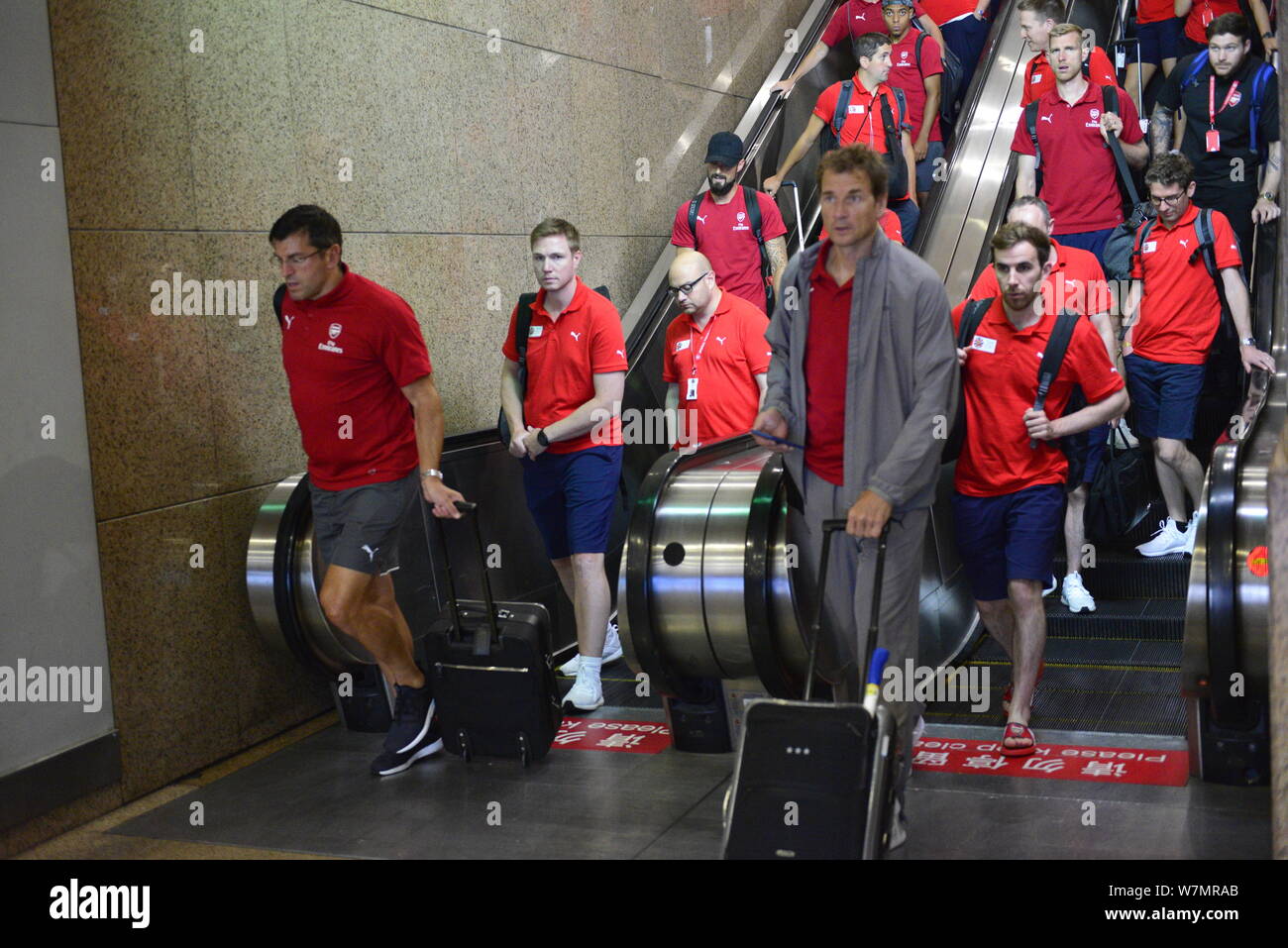 Players and coaching staff of Arsenal F.C. are pictured after arriving ...