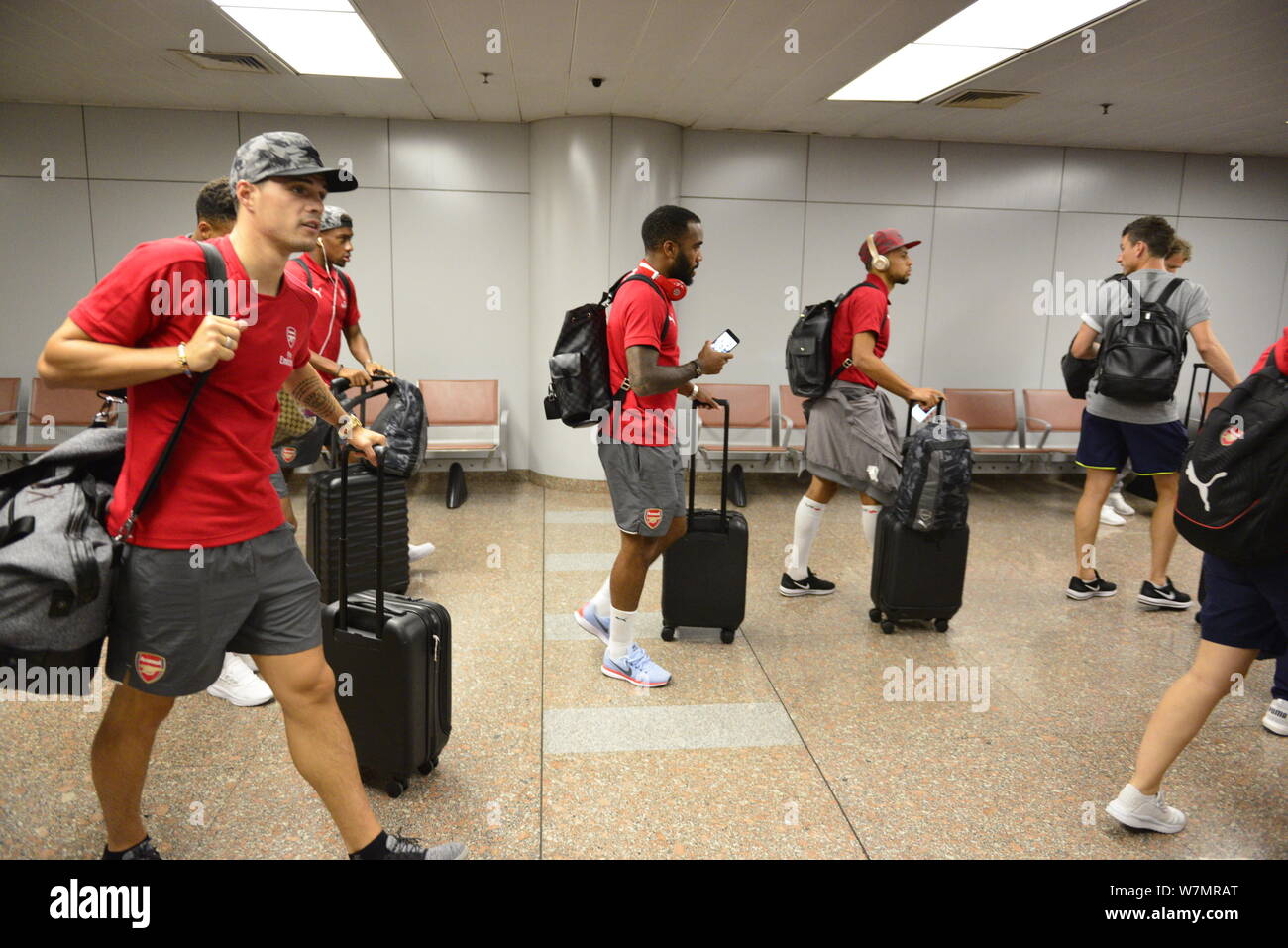 Players and coaching staff of Arsenal F.C. are pictured after arriving ...