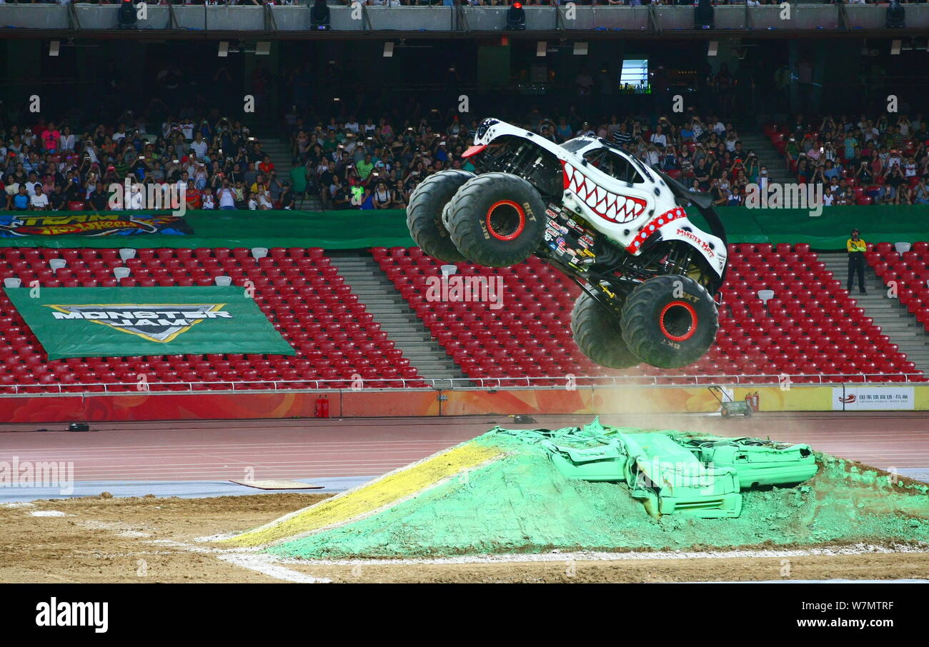 A Monster Jam truck performs wild stunts during the Monster Jam 2017 in ...