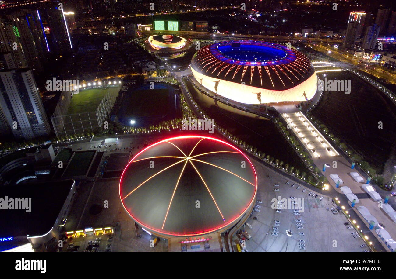 Aerial view of the Tianjin Olympic Center Stadium at night in Tianjin ...