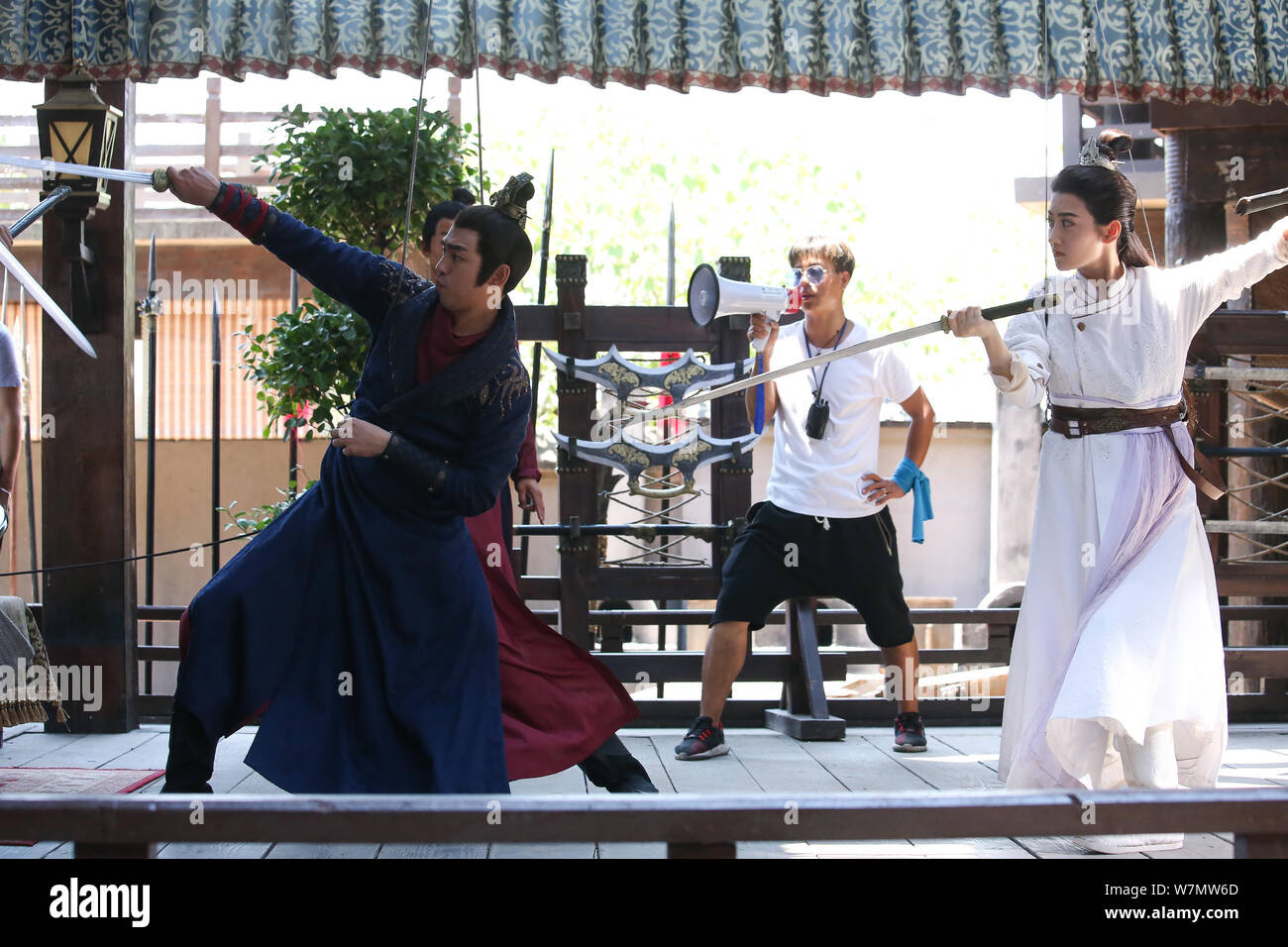 Chinese actress Jing Tian, right, and Taiwanese actor Chen Bolin, left ...