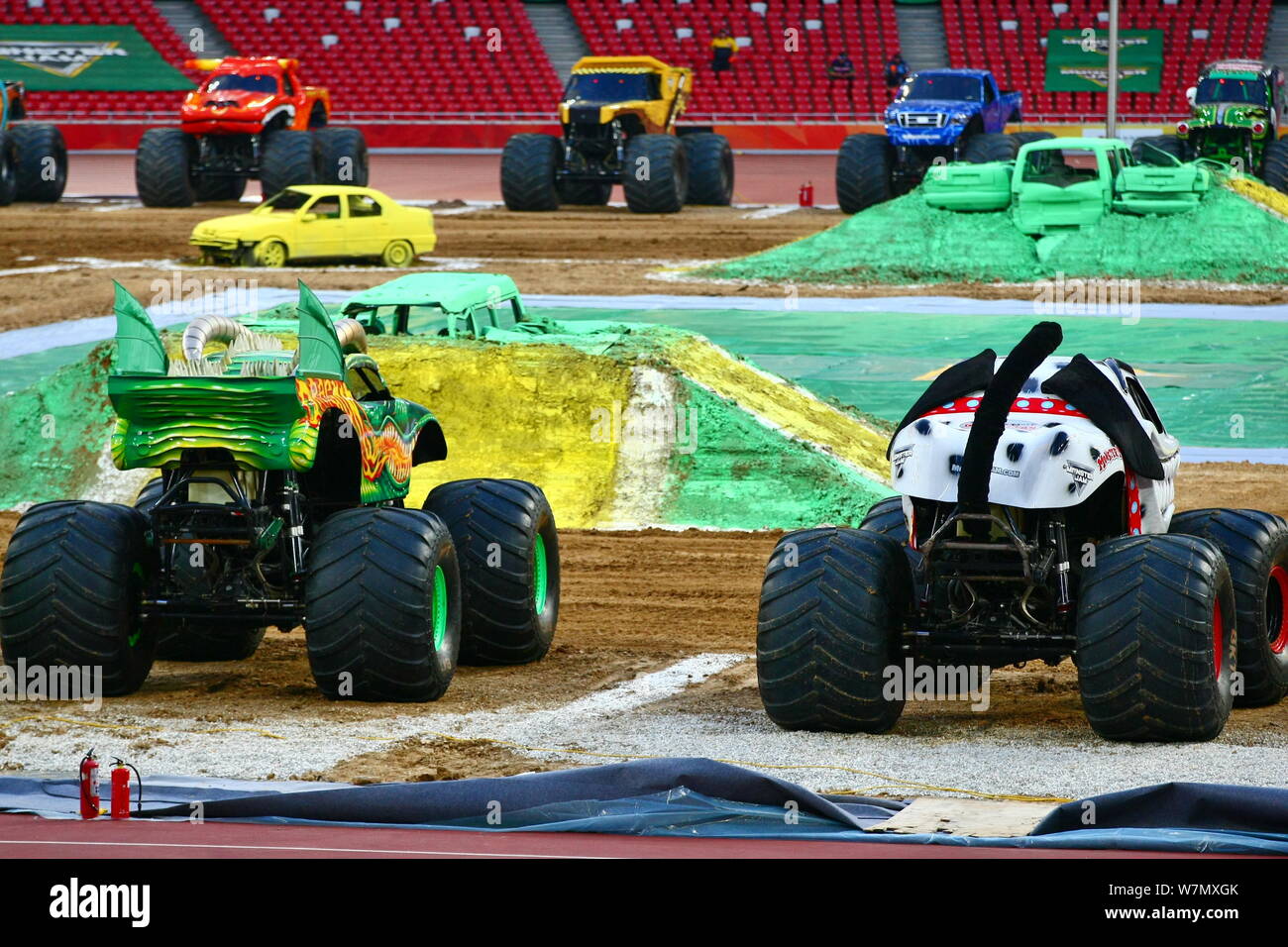 Monster Jam trucks prepare to perform wild stunts during the Monster ...