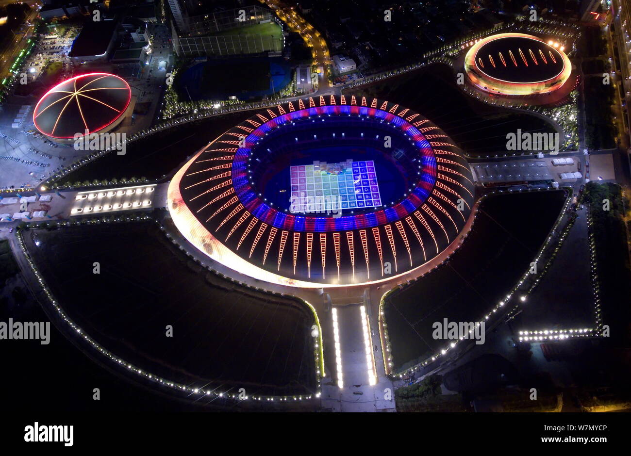 Aerial view of the Tianjin Olympic Center Stadium at night in Tianjin ...