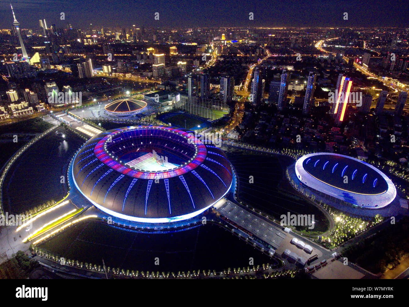 Aerial view of the Tianjin Olympic Center Stadium at night in Tianjin ...