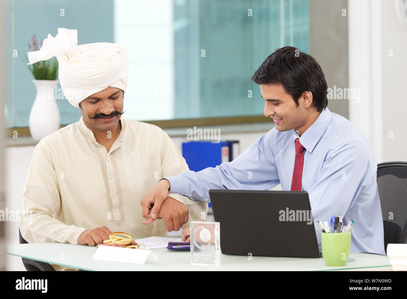 Rural man taking loan against gold Stock Photo - Alamy