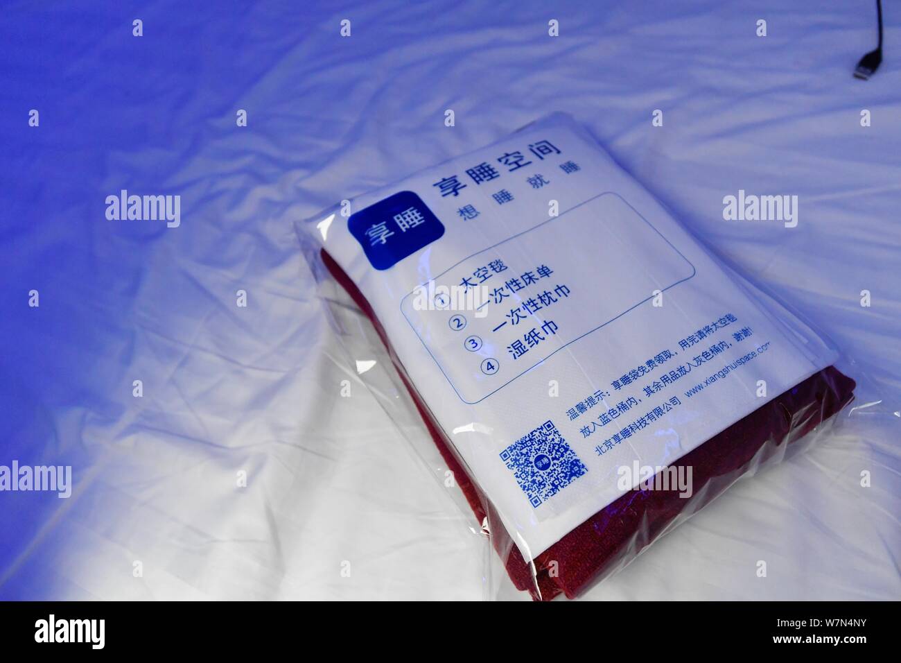 Interior view of a pod at a "sleep-sharing" capsule hotel in the ...