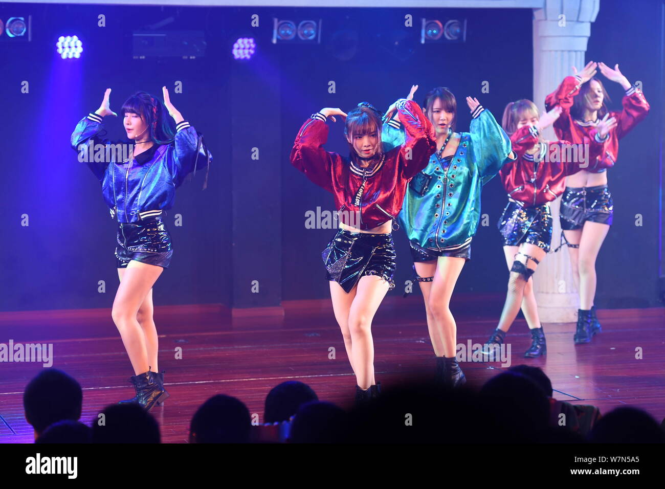 Members of Chinese idol girl group SNH48 TEAM HII perform during the public debut of their 4th ...