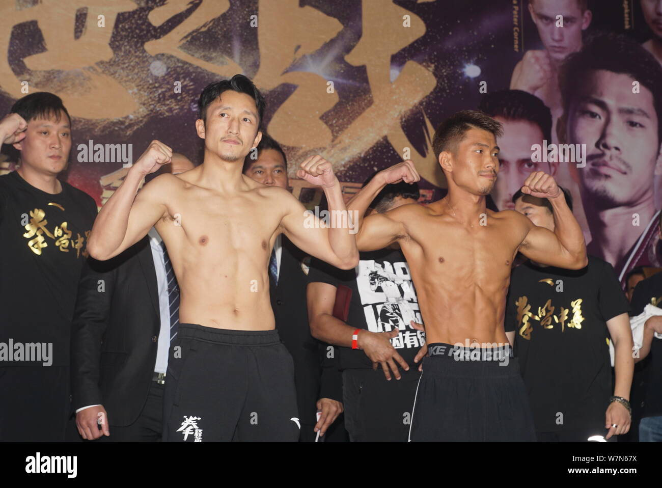 Chinese boxing star Zou Shiming, left, and Japanese boxer Sho Kimura ...