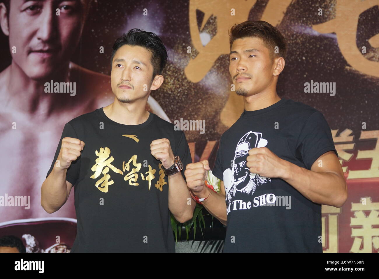 Chinese boxing star Zou Shiming, left, and Japanese boxer Sho Kimura ...
