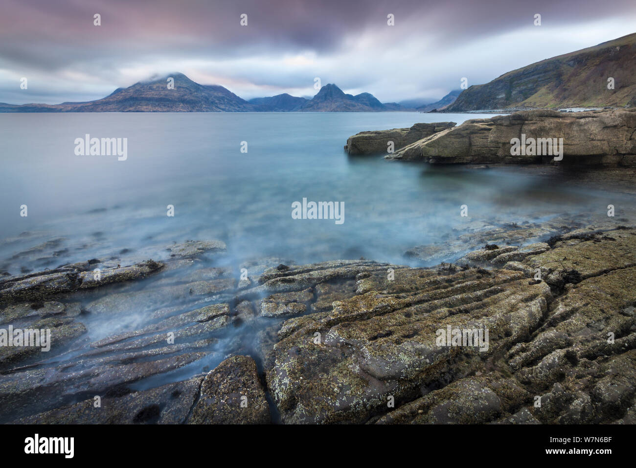 View of the Cuillin Hills across Loch Scavaig from Elgol Beach. Isle of ...