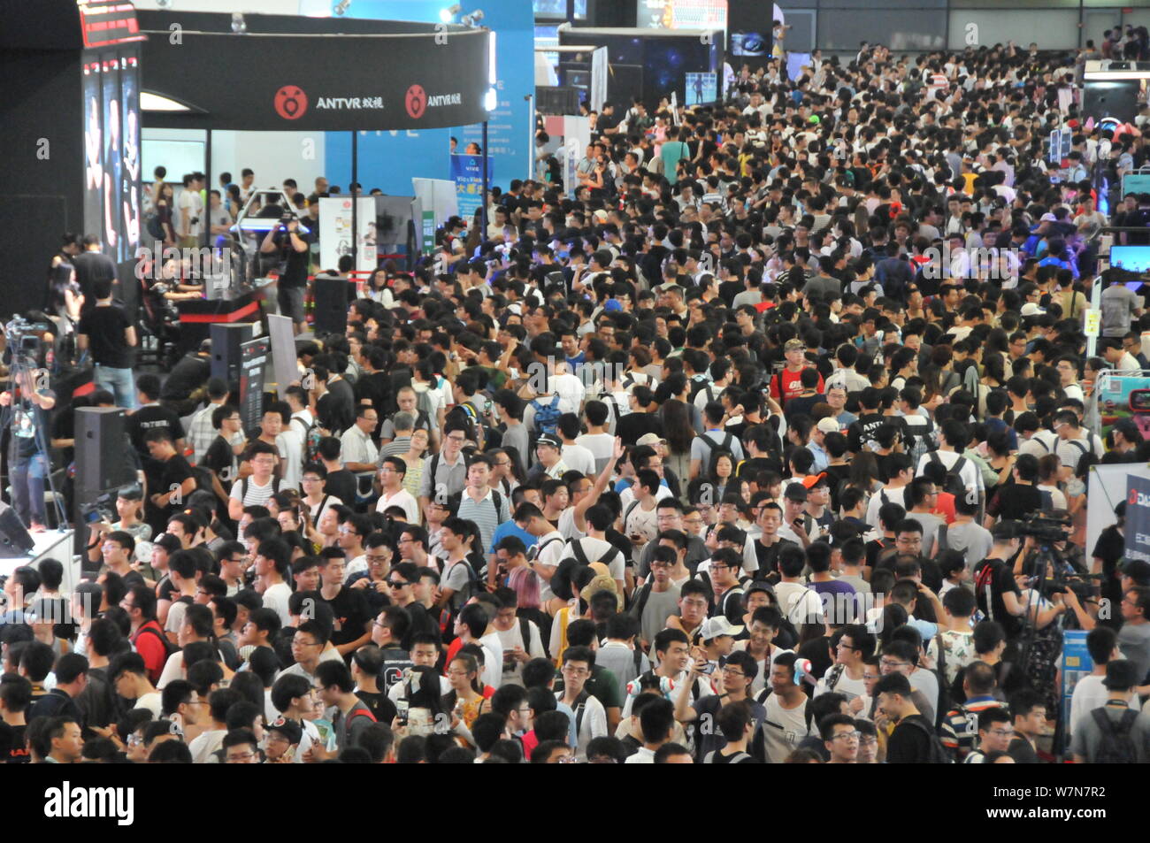 Visitors crowd the 15th China Digital Entertainment Expo, also known as ...