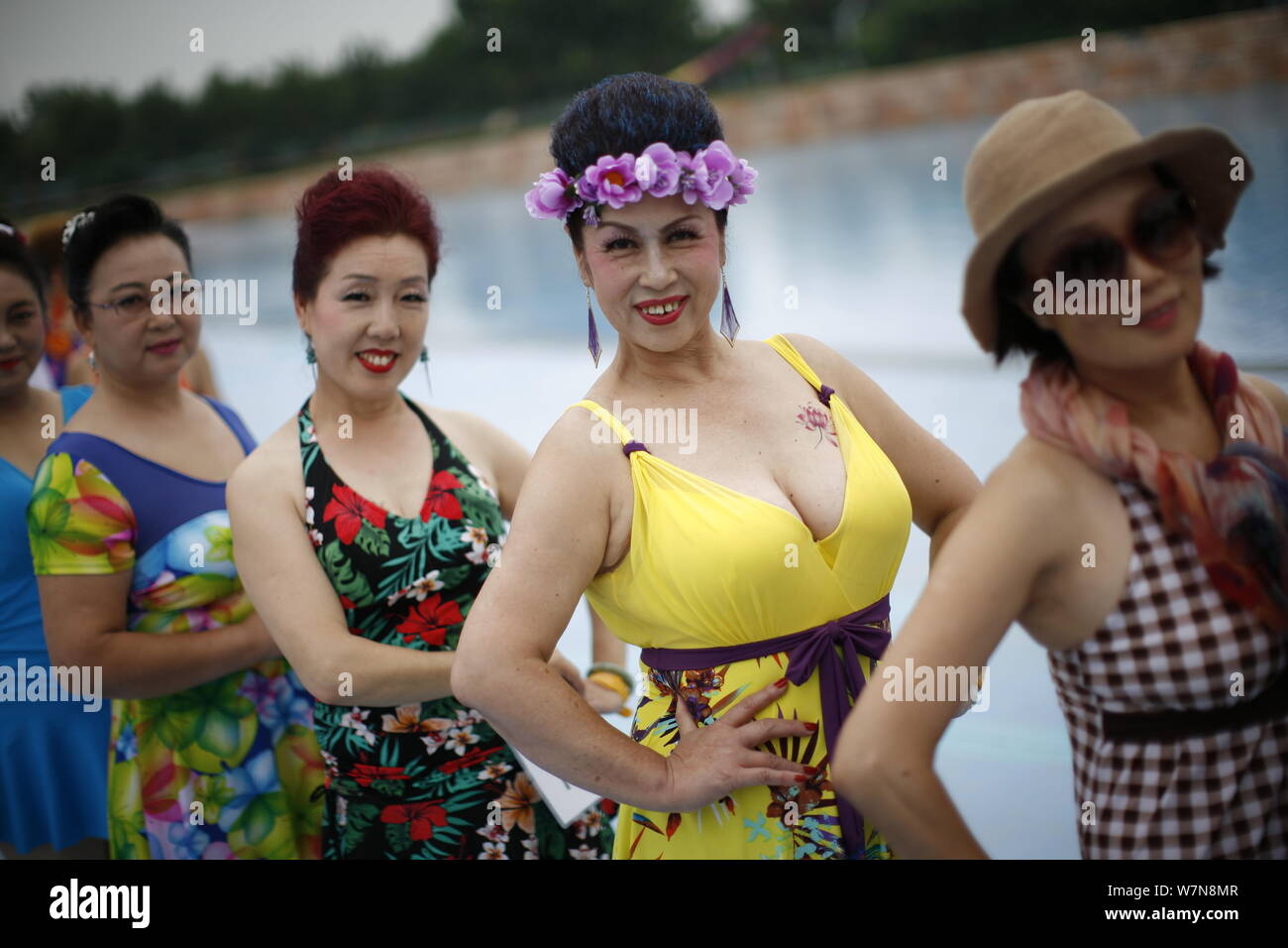 Elderly Chinese women dressed in bikini pose during a middle-aged and ...