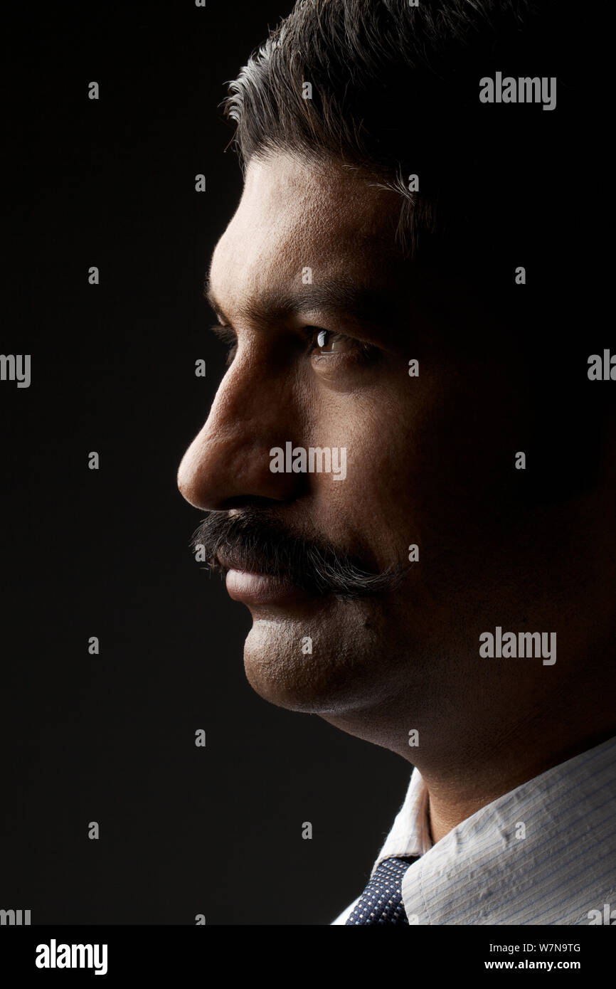 Side profile of a man thinking Stock Photo - Alamy