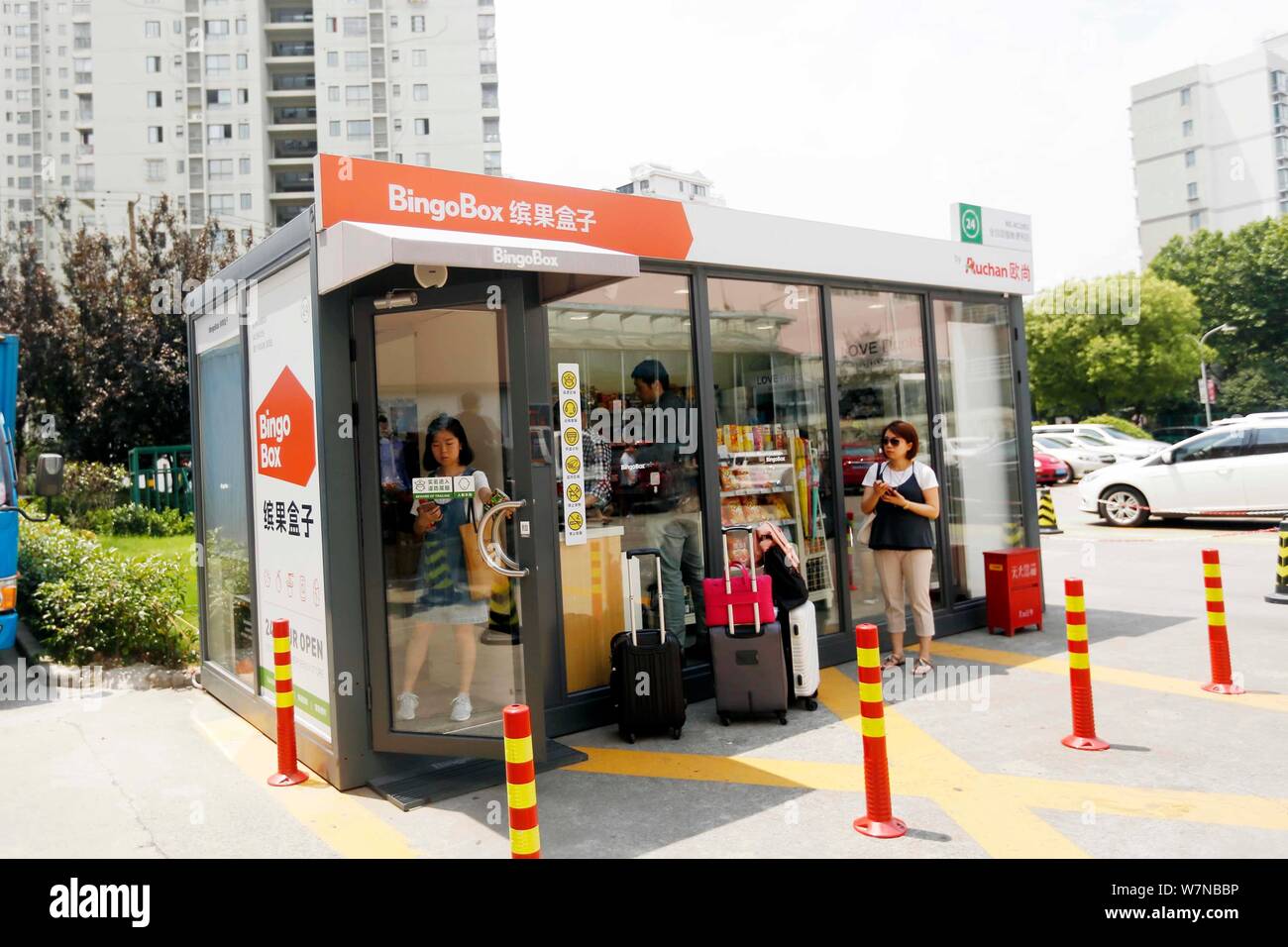 A customer leaves the BingoBox, an unmanned 24-hour and self-service ...