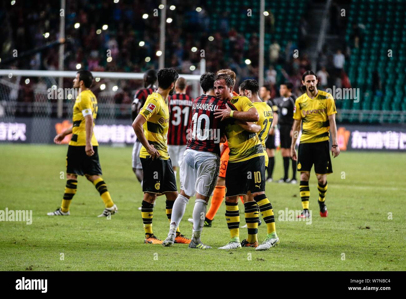 German football player Mario Getze of Borussia Dortmund, right, hugs ...
