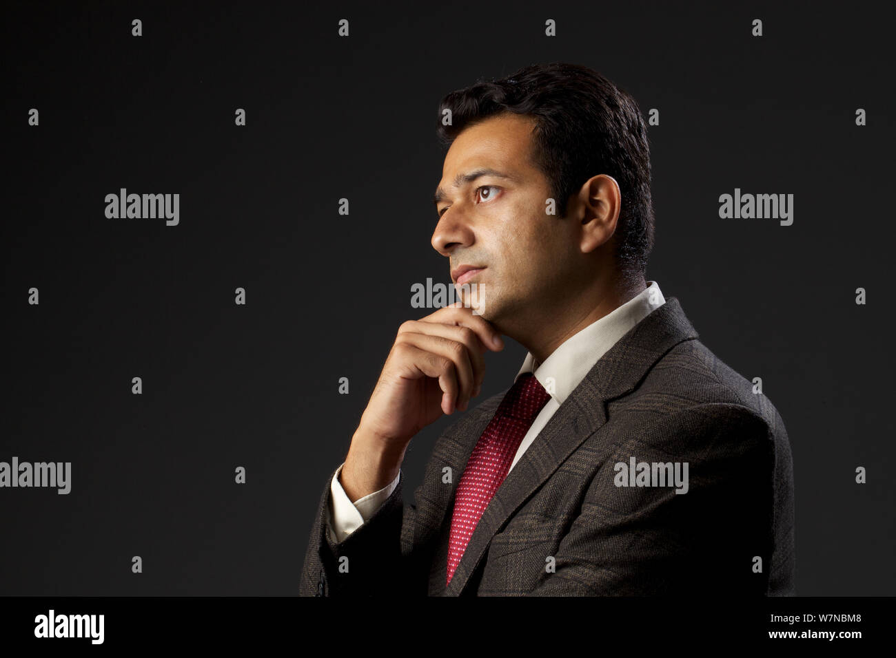 Pensive middle aged businessman thinking hi-res stock photography and ...