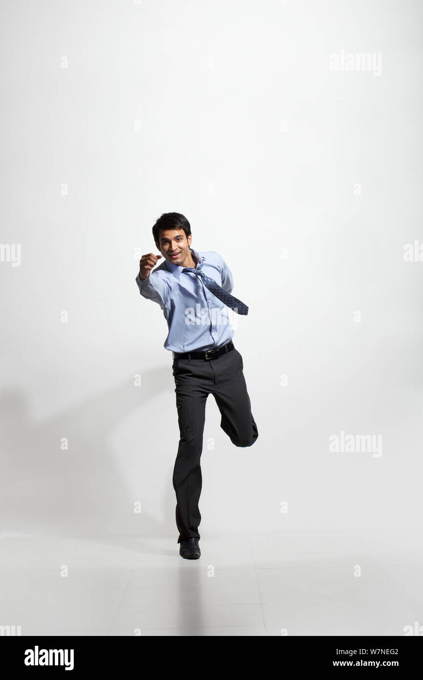 Full length action determination effort hi-res stock photography and ...