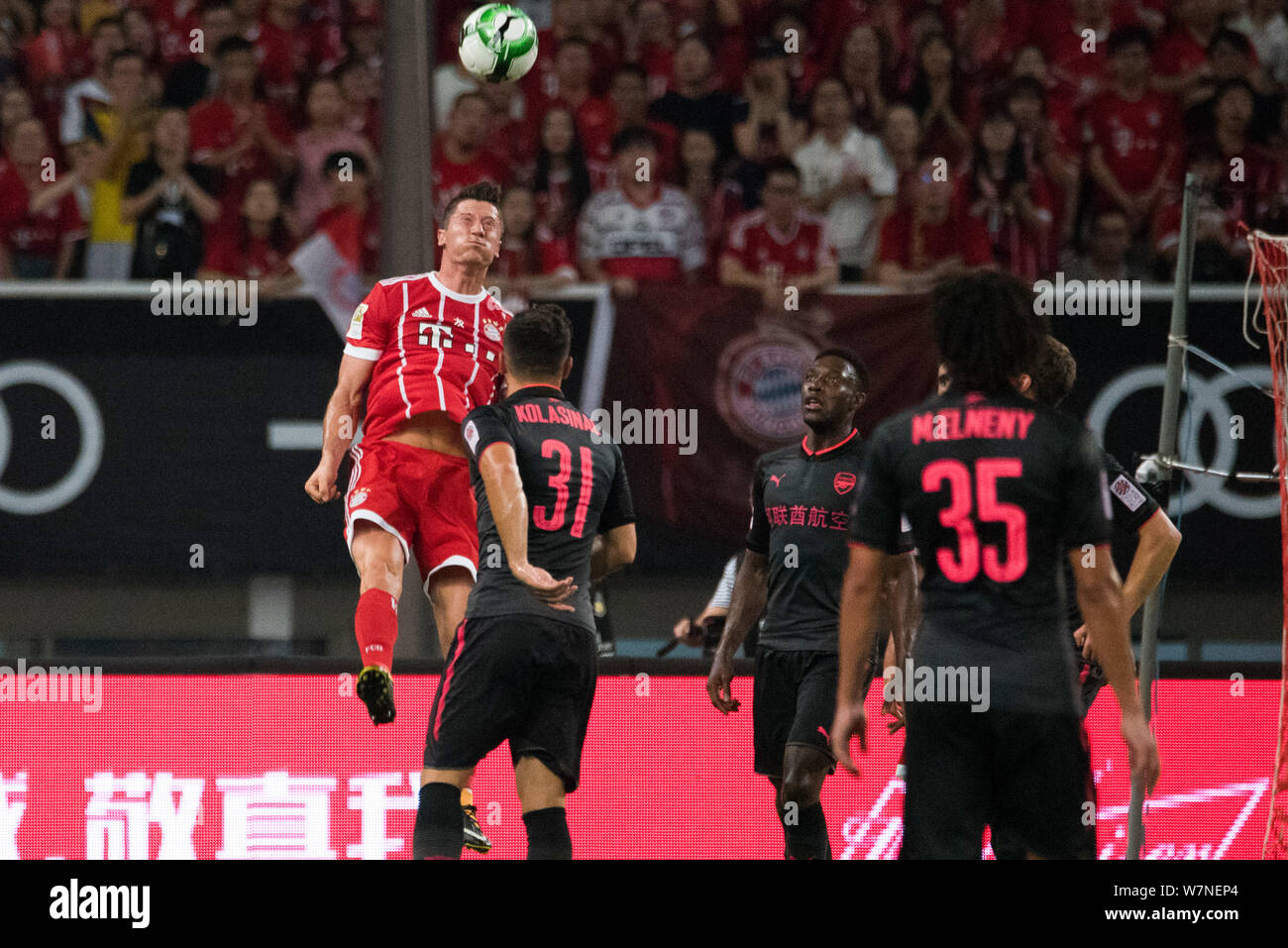 Polish football player Robert Lewandowski, upper, of Bayern Munich ...