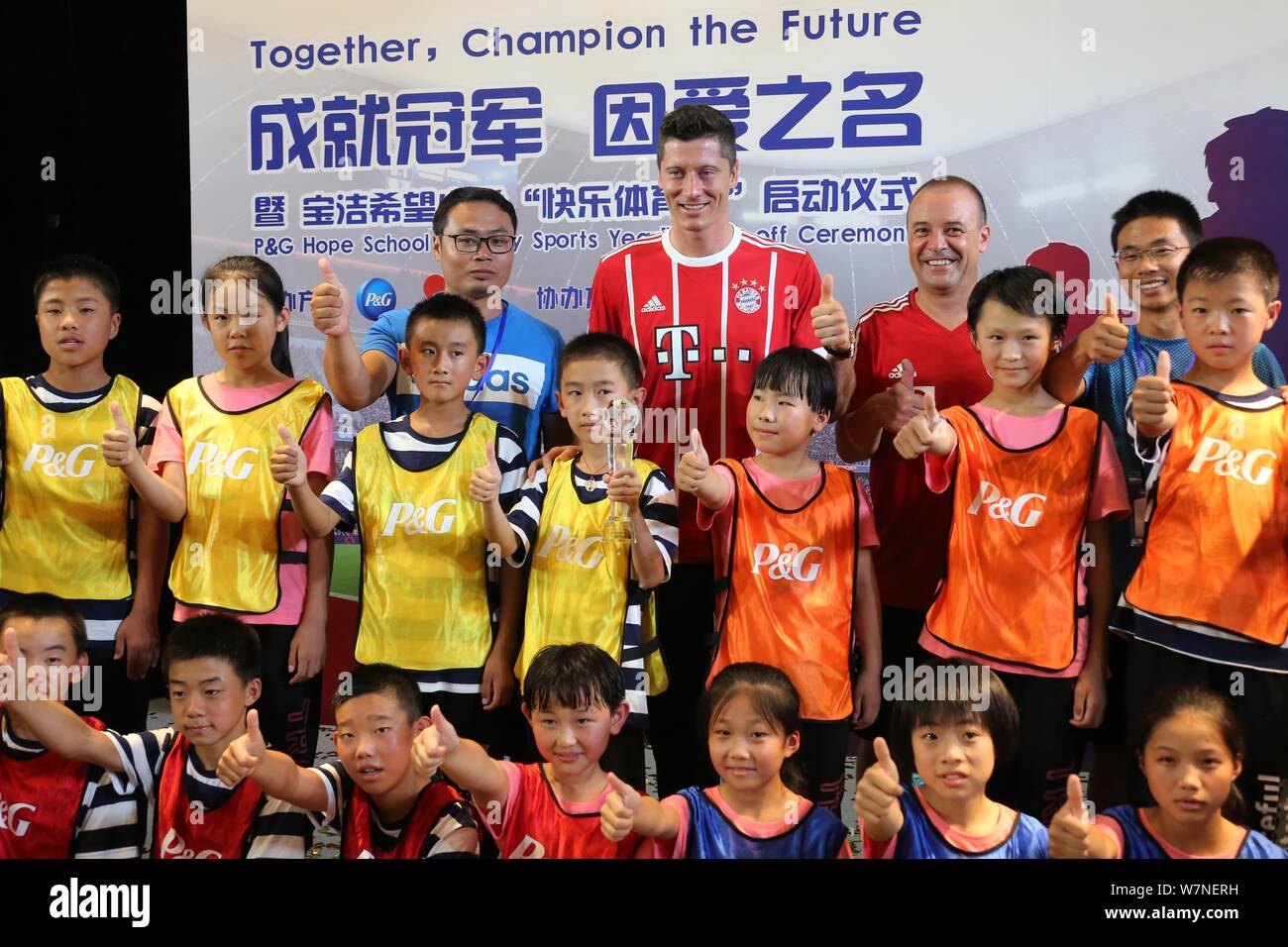 Polish football player Robert Lewandowski of Bayern Munich, center ...