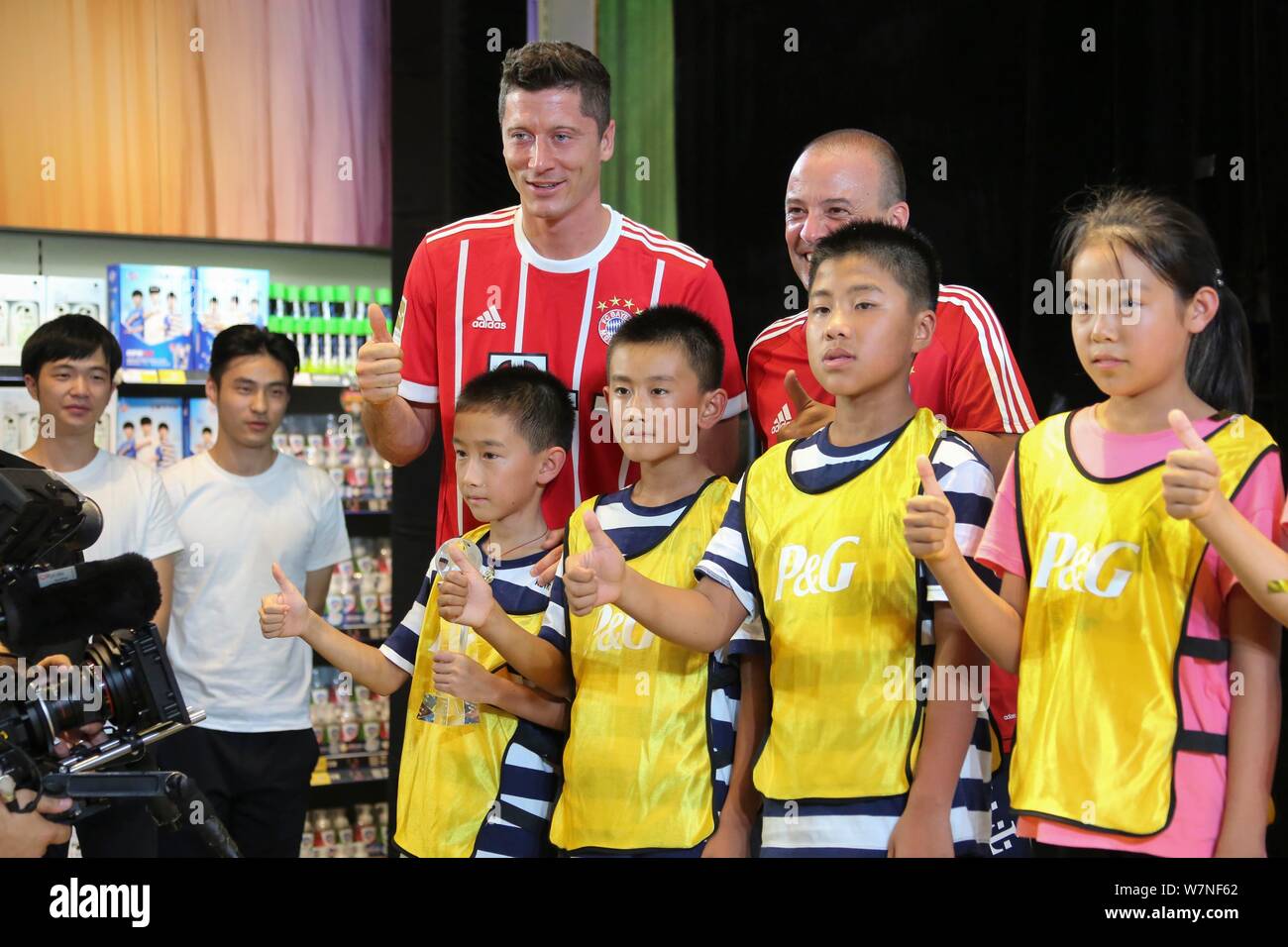 Polish football player Robert Lewandowski of Bayern Munich, center ...