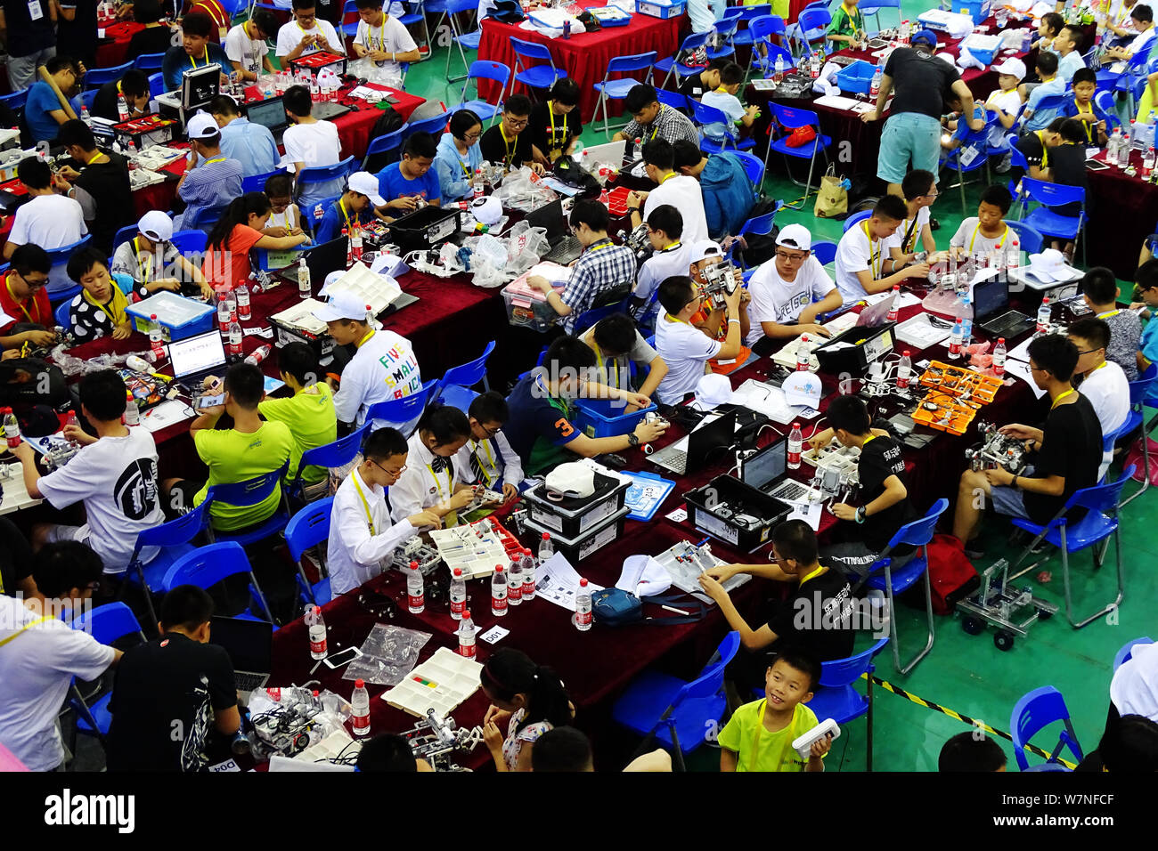 Teen contestants take part in the national final of the RoboCom ...