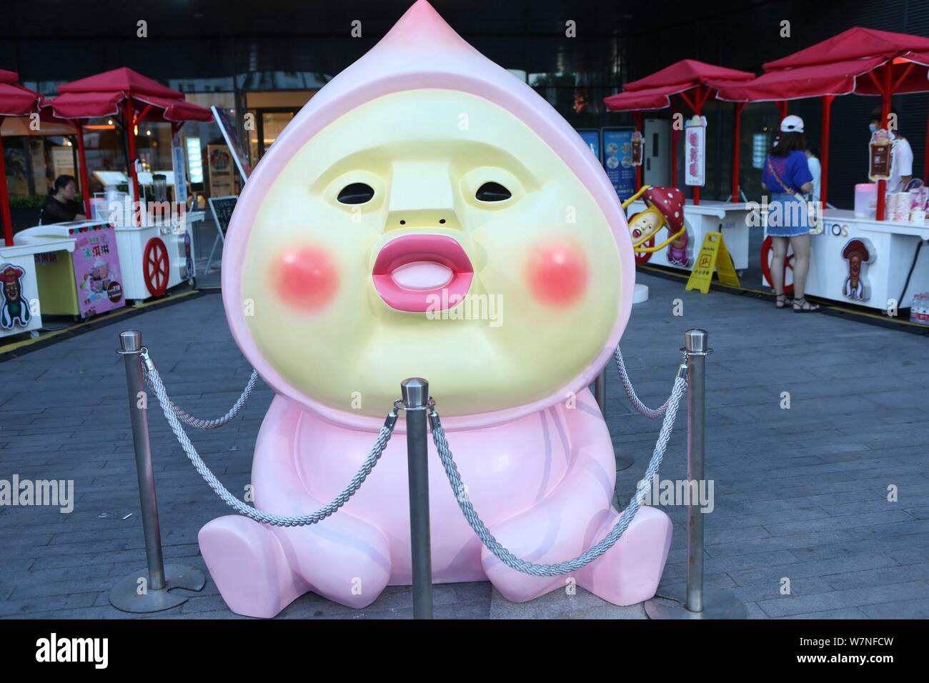 A sculpture of Kobitos, a popular Japanese cartoon character, is ...