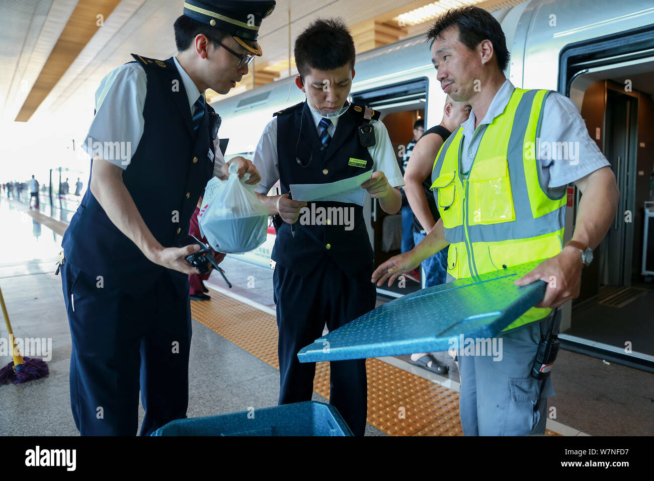 Train staff hi-res stock photography and images - Alamy