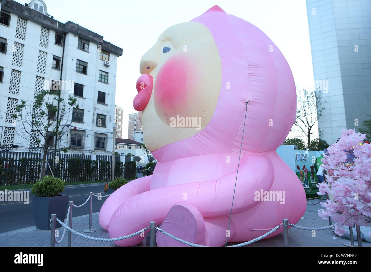 A 6-meter-tall giant inflatable Kobitos, a popular Japanese cartoon ...