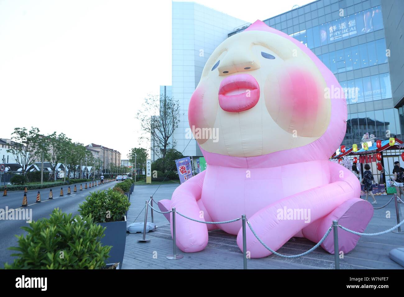 A 6-meter-tall giant inflatable Kobitos, a popular Japanese cartoon ...