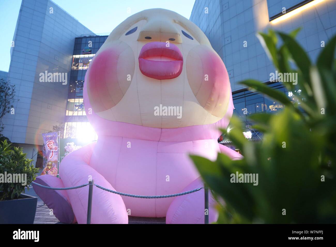 A 6-meter-tall giant inflatable Kobitos, a popular Japanese cartoon ...