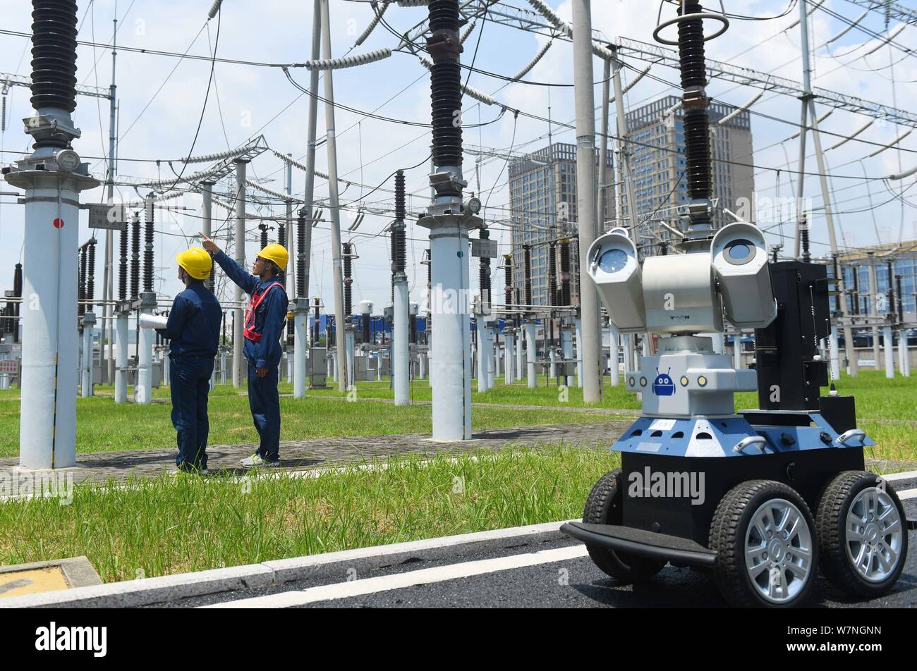 A robot is pictured as it is used to help Chinese workers check the ...